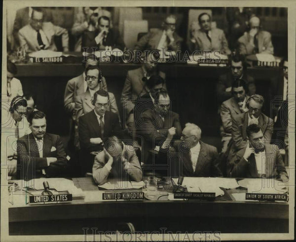 1976 United Nations delegates wear headphones to hear interpreters ...