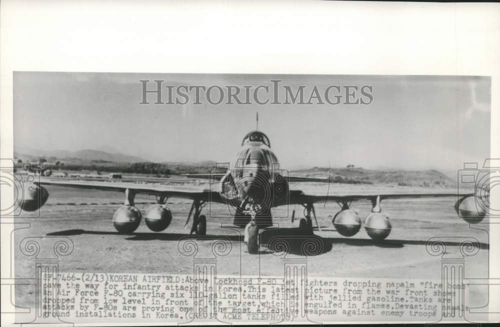 Air Force F-80 carrying six napalm "fire bombs" at Korean airfield ...