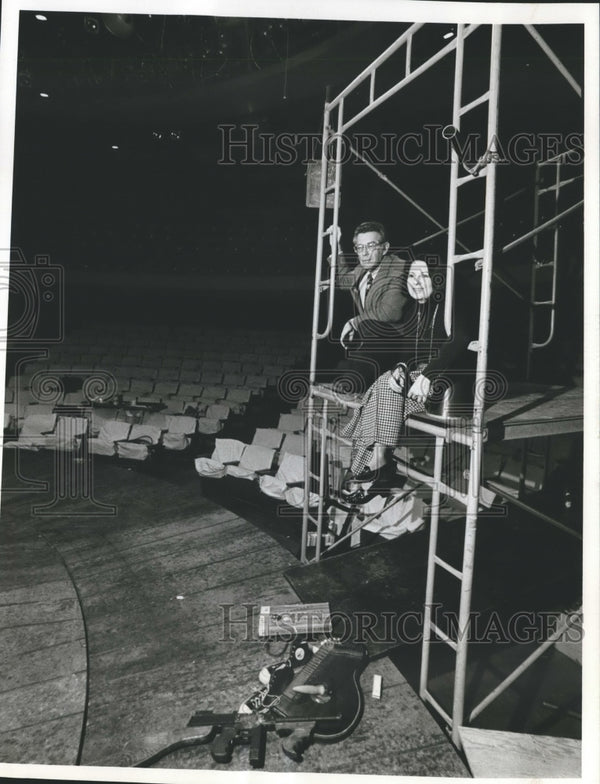 1976, Zella and Tom Fichandler posing on Arena Stage scaffolding ...
