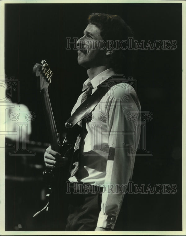 1983, Guitarist Daryl Stuermer with performs Phil Collins. - Historic ...