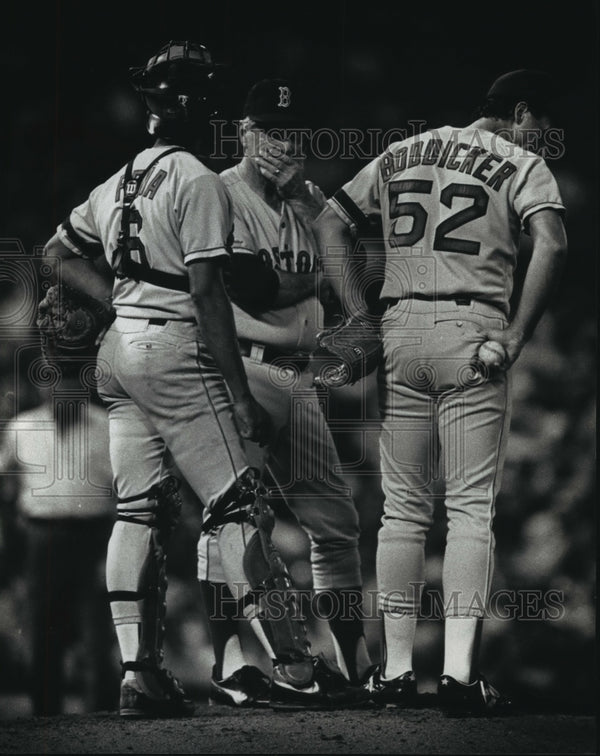 1990 Press Photo Boston manager Joe Morgan, players Mike Boddicker & T ...