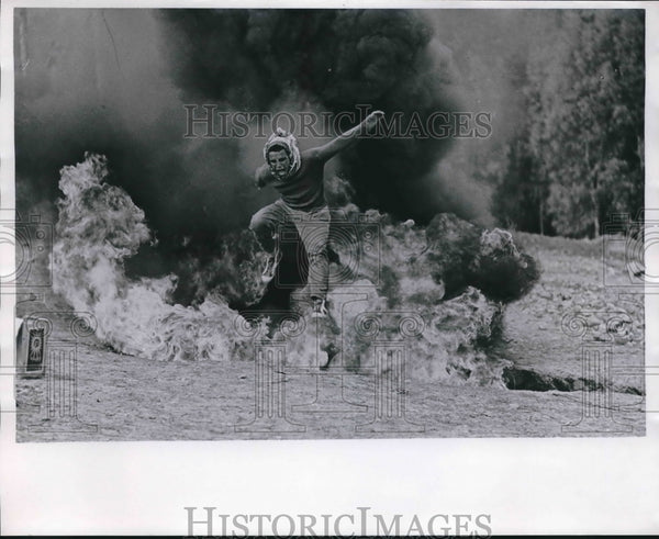 1969 Al Fatah recruit dashes through gas fire in training, Jordan ...