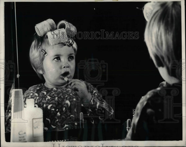 1969 Louise Eggit of New Malden, being like her mother. - Historic Images