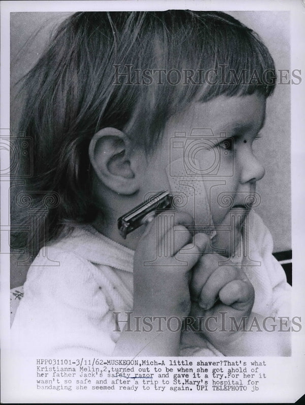 1962 Kristianna Melin Holding Father Jack's Safety Razor - Historic Images