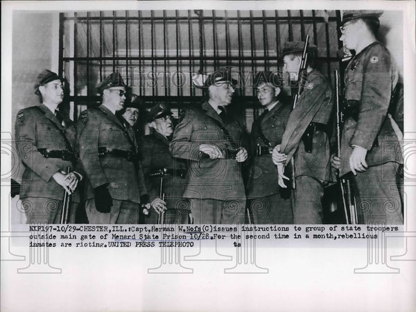 1952 Press Photo Capt. Herman W. Nofs Issues Instructions at Menard St ...