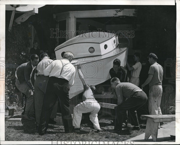 1942 John Negus and his neighbors launching his 18 foot ship - Historic ...