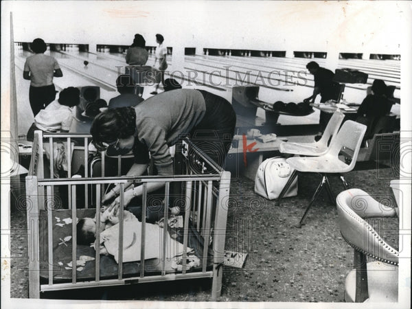 1961 Bowler Mrs. David E. Cavin Quiets Her 11 Month Old With Bottle ...