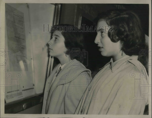 Sherry Spivack and Jo Ann David reading announcement - Historic Images