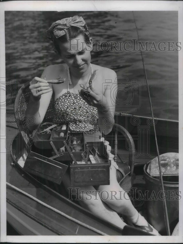 1938 Joanne Goodwin can't make out what lure to use - Historic Images
