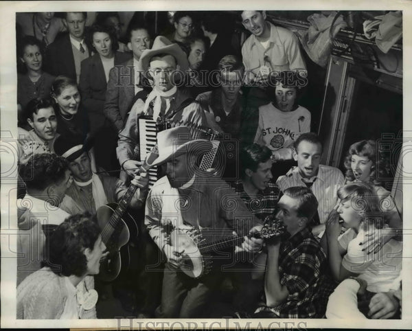 1946 Press Photo A cowboy band provides music during the train trip ...