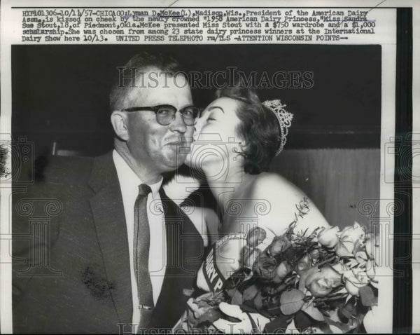 1957 Press Photo Lyman D. McKee Kissed by Dairy Princess Sandra Sue St ...