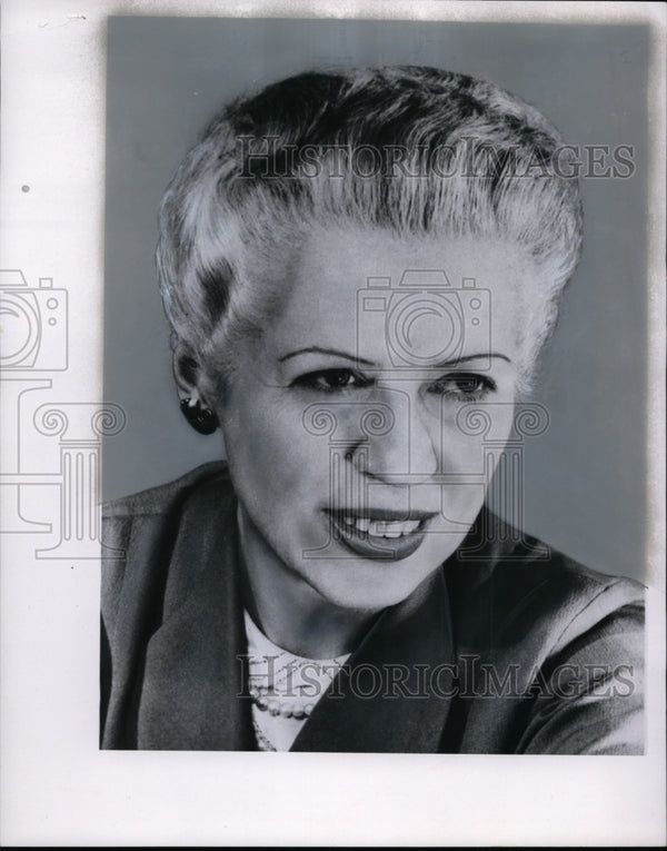 1961 Marie Doerr in a business suit - Historic Images