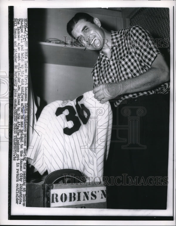 1956 Press Photo Yankee 1st Baseman Eddie Robinson Holds Uniform - nes ...