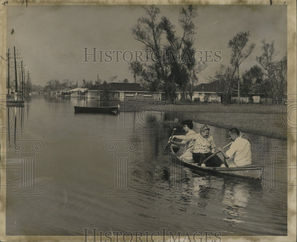1965 Flood - William Perrott shuttles neighbors in flood waters ...