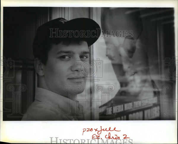 Chris Brand, movie magazine writer, poses for pix on Canal Street ...