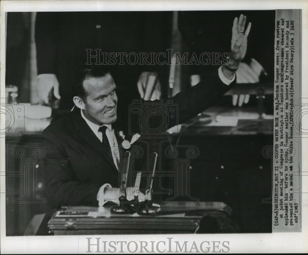 1963 Major Gordon Cooper waves from rostrum at Congress meeting ...