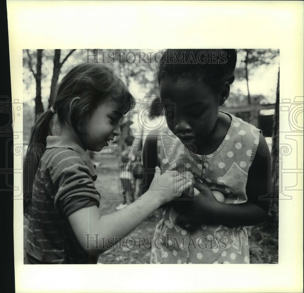 1991 Kiara Cook ad Josephine Ray hunt Easter eggs in Slidell ...