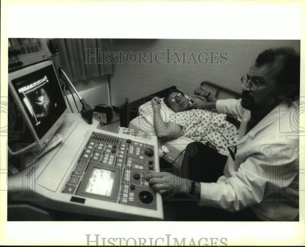 1993 cardiac sonographer Curtis Hanawalt performs ECG on Jeff Parish ...