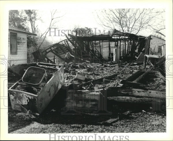 1990 Press Photo Charred remains of the house of Judith White on Reno ...