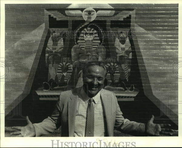 1985 Dr. Robert Gaut, O. Perry Walker H.S. principal, by art mural ...