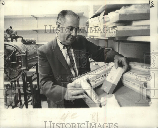 1974 Dr. Ray Evers checks supplies at Meadowbrook Hospital - Historic ...