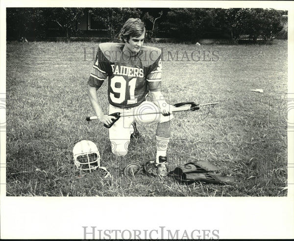 1978 Football, Keith Goodfellow of Rummel holding a fishing spear ...