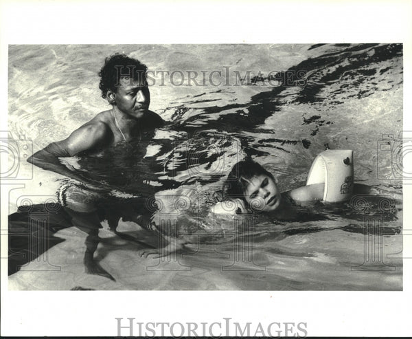 1984 Swim instructor Joseph Gibson and student Stephanie Hiser ...