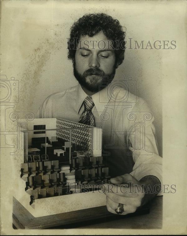 1975 Keith Hooks with a miniature display. - nob34928 - Historic Images