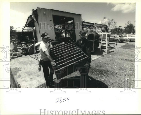 1993 Press Photo Tony Oliveri and Jerry Jacob clean up after a tornado ...