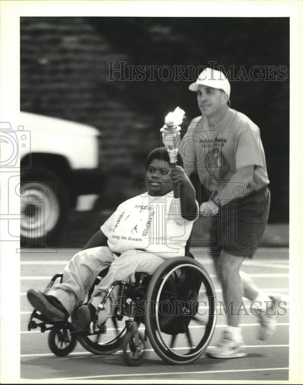 1994 Greg Maurin pushes Michael Chapman during Special Olympics Game ...