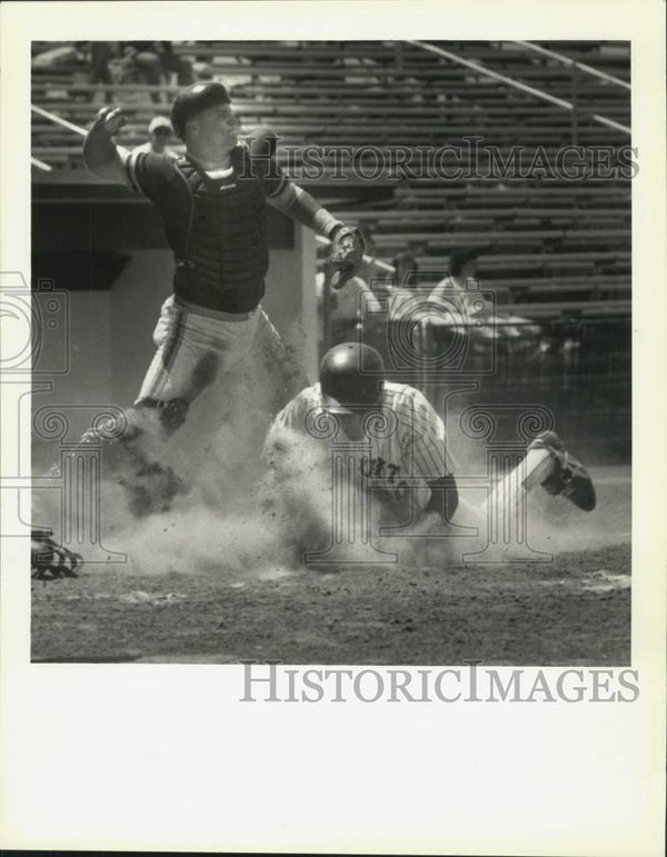 1988 Press Photo Jesuit Player Slides Into Home In Acadiana Game, Bato ...