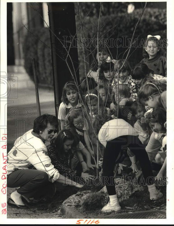 1987 Patsy Hardin, Brownie Troop 977 leader plants myrtle tree ...