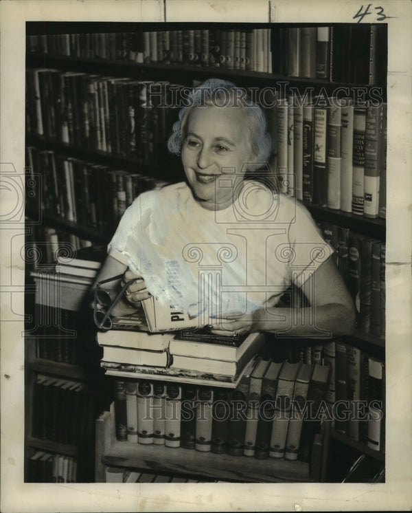 1953 Bookshop owner Tess Crager with some of her inventory - Historic ...