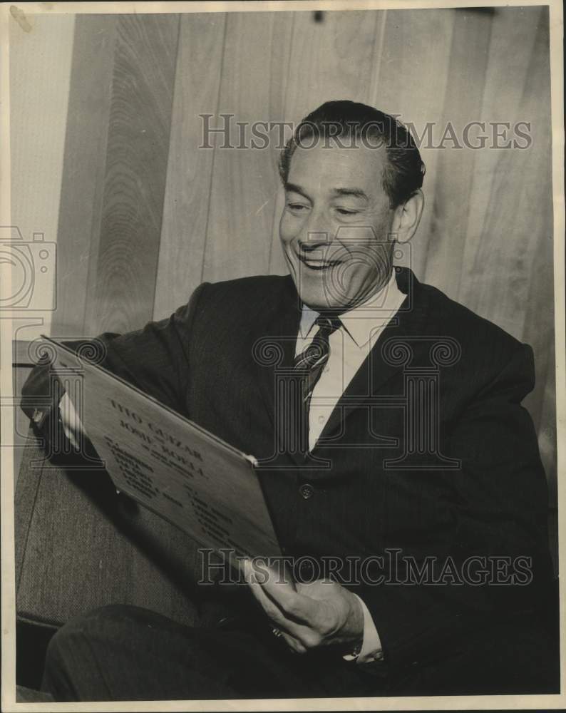 1964 Singer Tito Guizar Holding a Vinyl of His Album - Historic Images