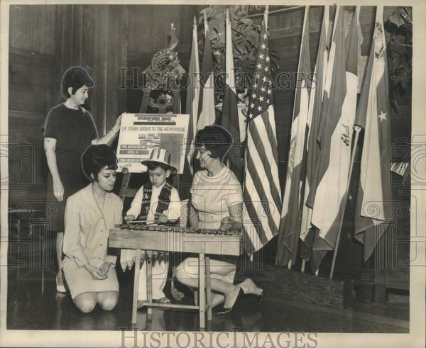 1967 Press Photo Staff at Pan American Week display, International Hou ...