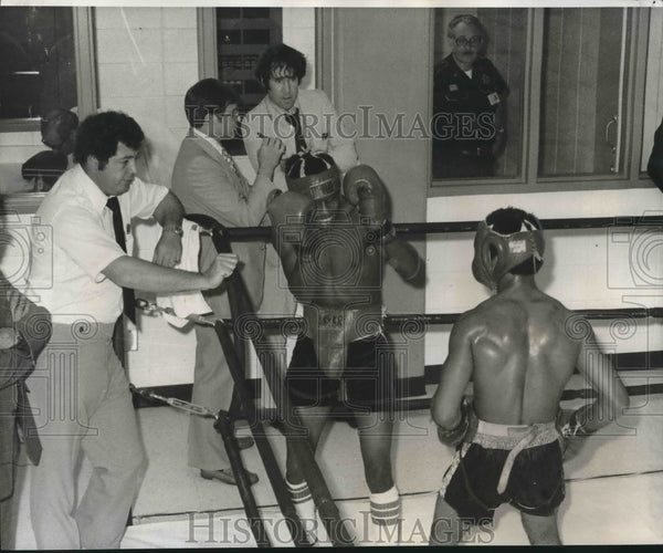 1977 Coach Leslie Bonano eyes his charges during workout in Boxing ...