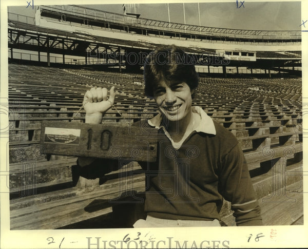 1979 Steve Foley, Football Player Holds Number Sign at Stadium ...
