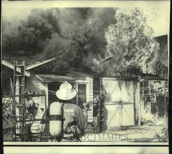1971 Firemen respond to house fire, aftermath of earthquake. - Historic ...