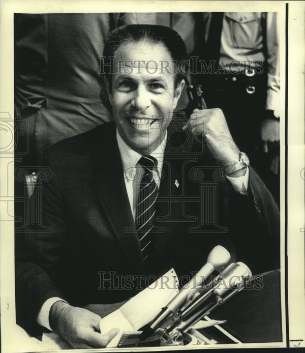 1973 H.R. Haldeman smiles as he reads telegrams at Watergate hearing ...