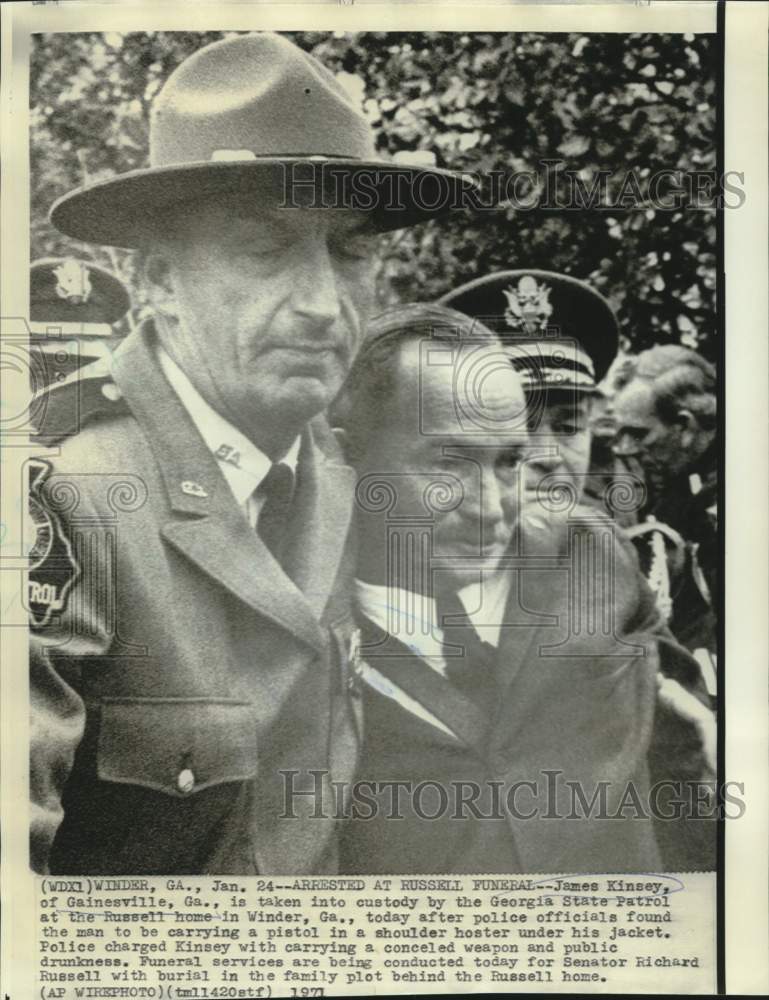 1971 Press Photo James Kinsey arrested at Senator Russell's funeral ...