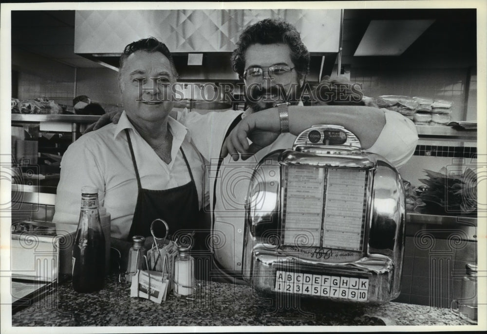 1989 Bob Davis Sr. and Bob Davis owners of Wolffy's at W 906 Francis ...