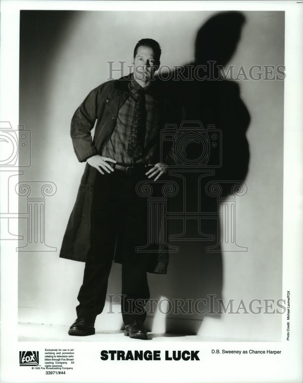 1995 D.B. Sweeney as Chance Harper in "Strange Luck" - Historic Images