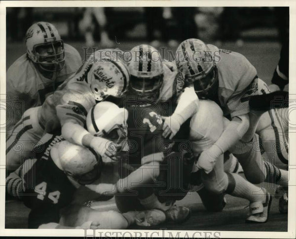 1983 Press Photo Homer Football Player Tim Cottrell at Game Tackle - s ...