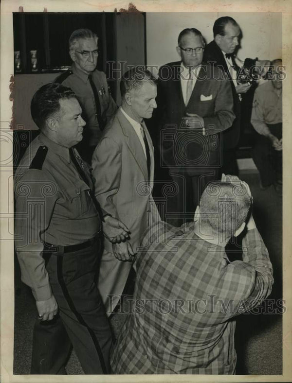 1964 Harold P. Lin escorted by police outside Albany, NY courthouse ...