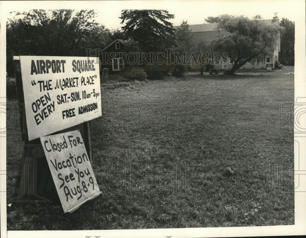 1981 Signs posted at Airport Market Square, Glenville, New York ...